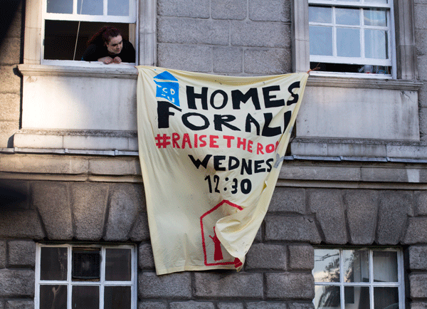 Banner Dropped from House Six Ahead of Housing March – The University Times